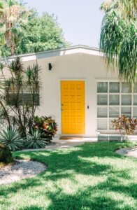 Embrace Sunshine Vibes with a Vibrant Yellow Front Door